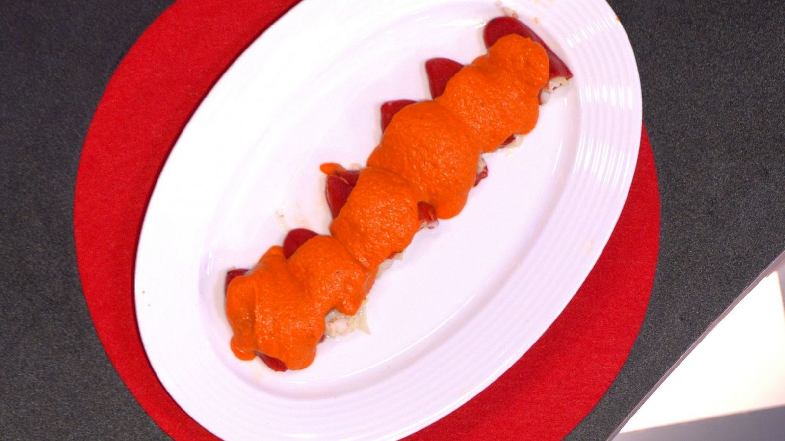 Receta de pimientos del piquillo rellenos en salsa